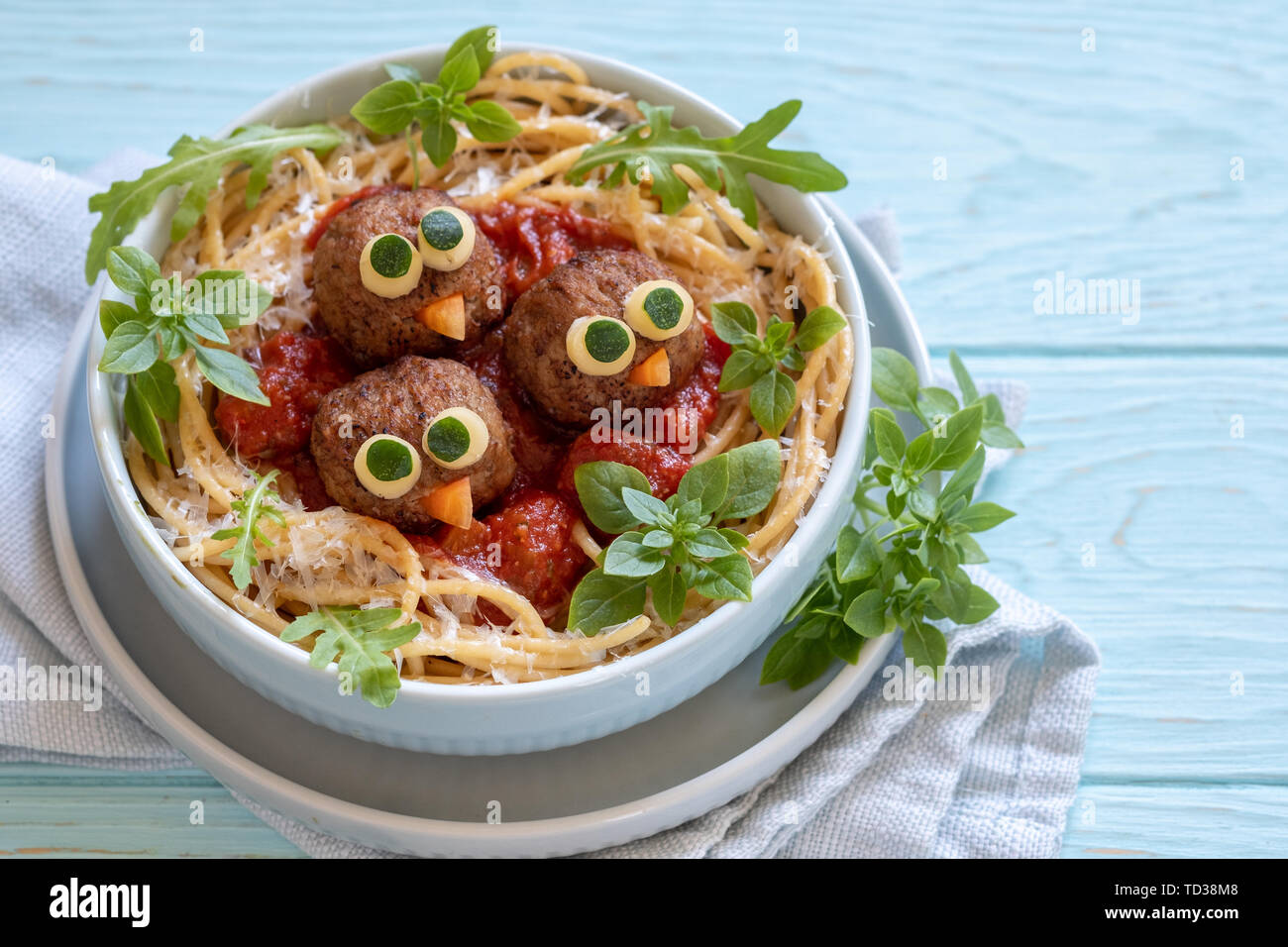 Pasta spaghetti with funny meatballs for kids. Birds in nests Stock ...