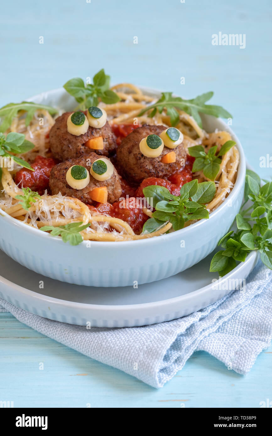 Pasta spaghetti with funny meatballs for kids. Birds in nests Stock ...