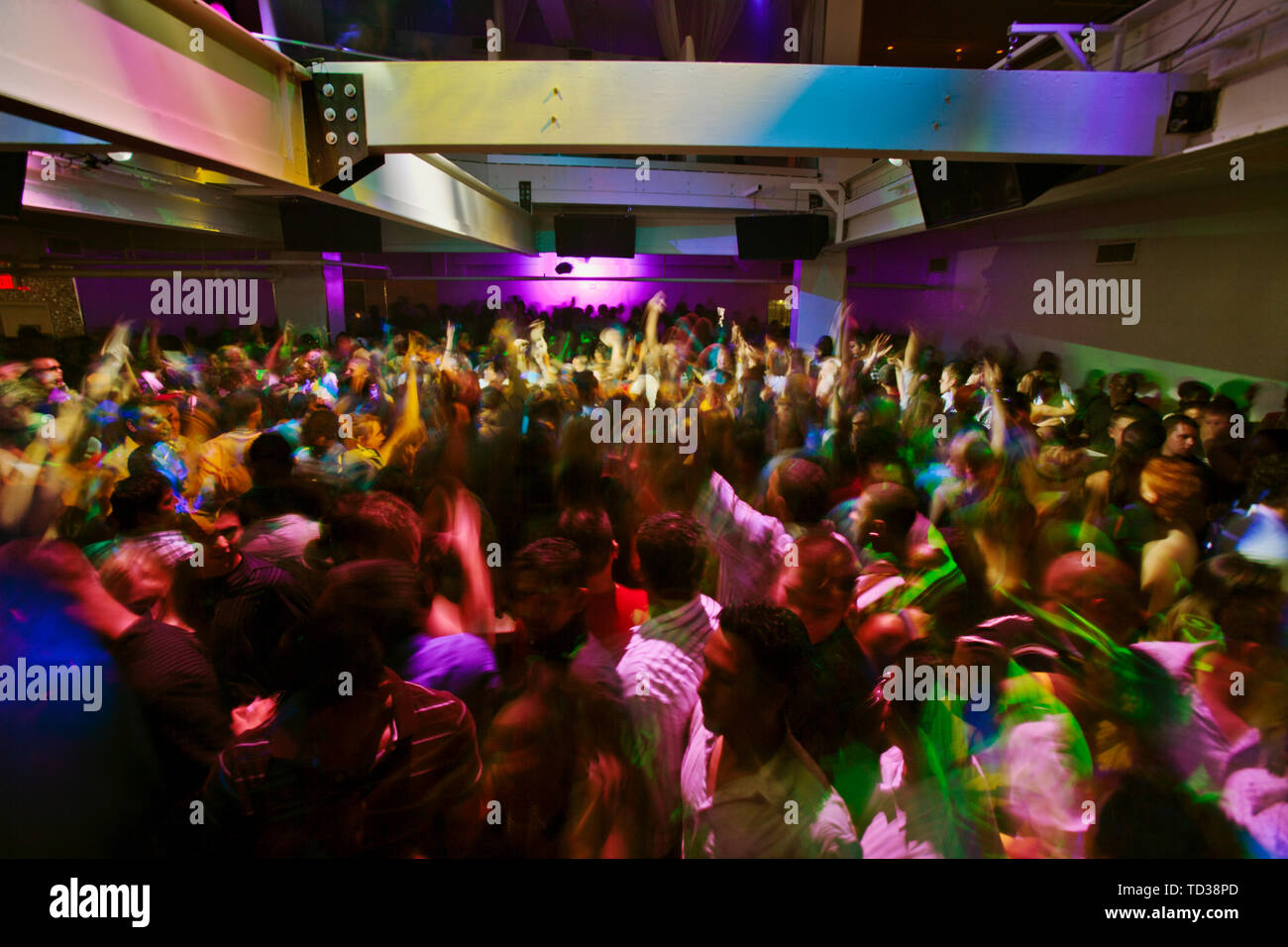 Crowd of people dancing at a concert Stock Photo - Alamy