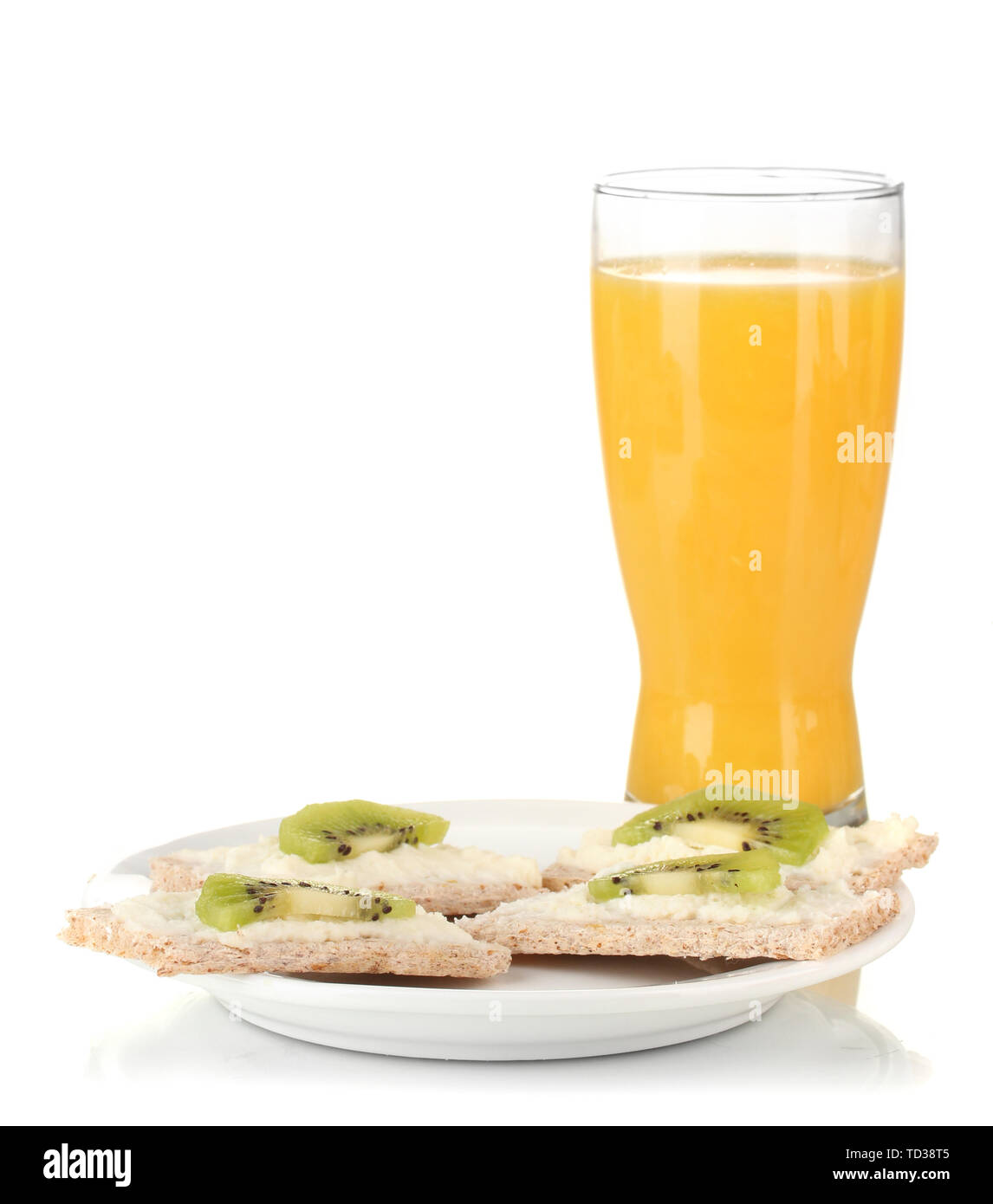Canapes with cheese and kiwi, on color plate, isolated on white Stock ...