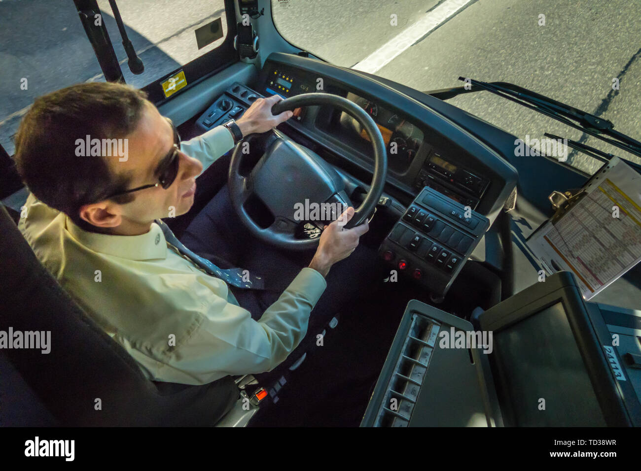 Pictures of a bus driver working Stock Photo - Alamy