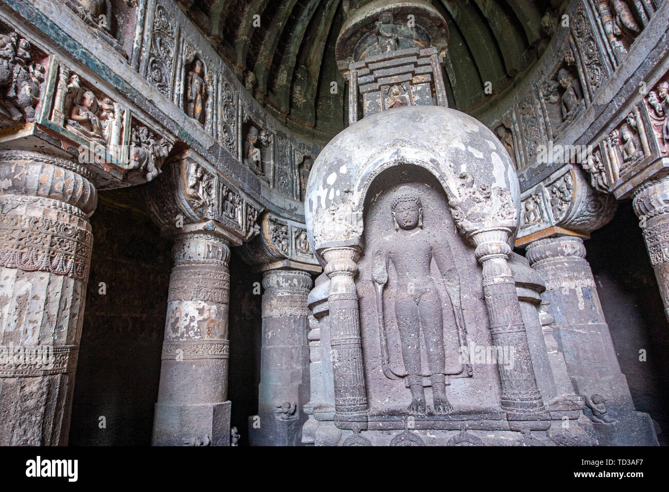 Stupa carved with a standing lord Buddha image, Cave 19 (5th century CE ...