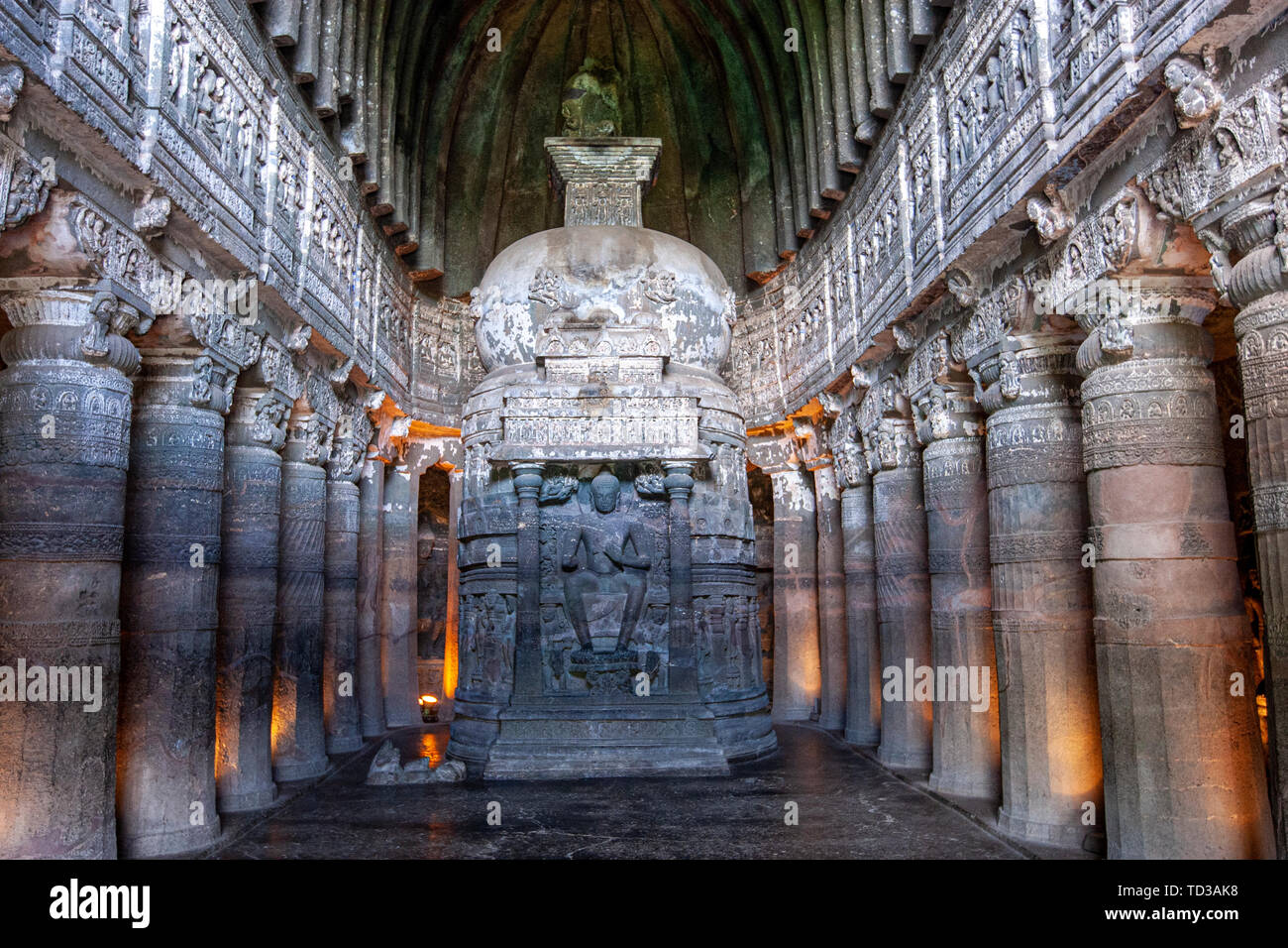 The sculptured dagoba (stupa), Buddha on its front,in the worship hall ...