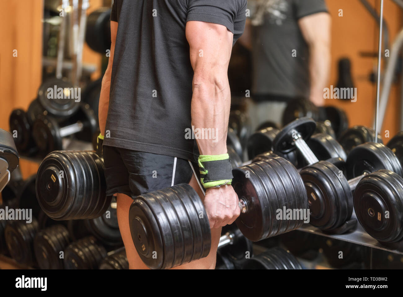 Holding up heavy weight hi-res stock photography and images - Alamy