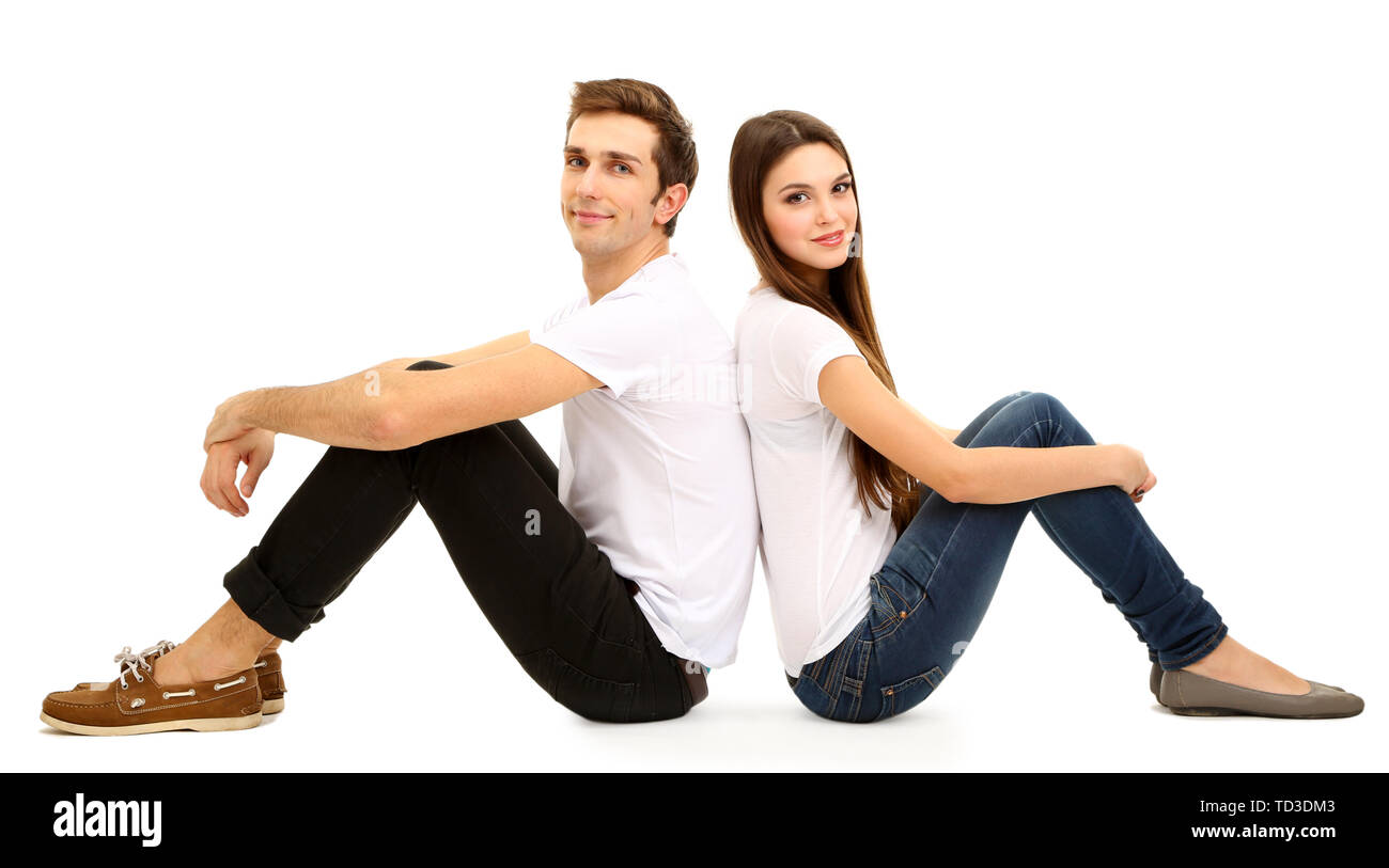 Loving couple sitting with back to each other on floor isolated on ...