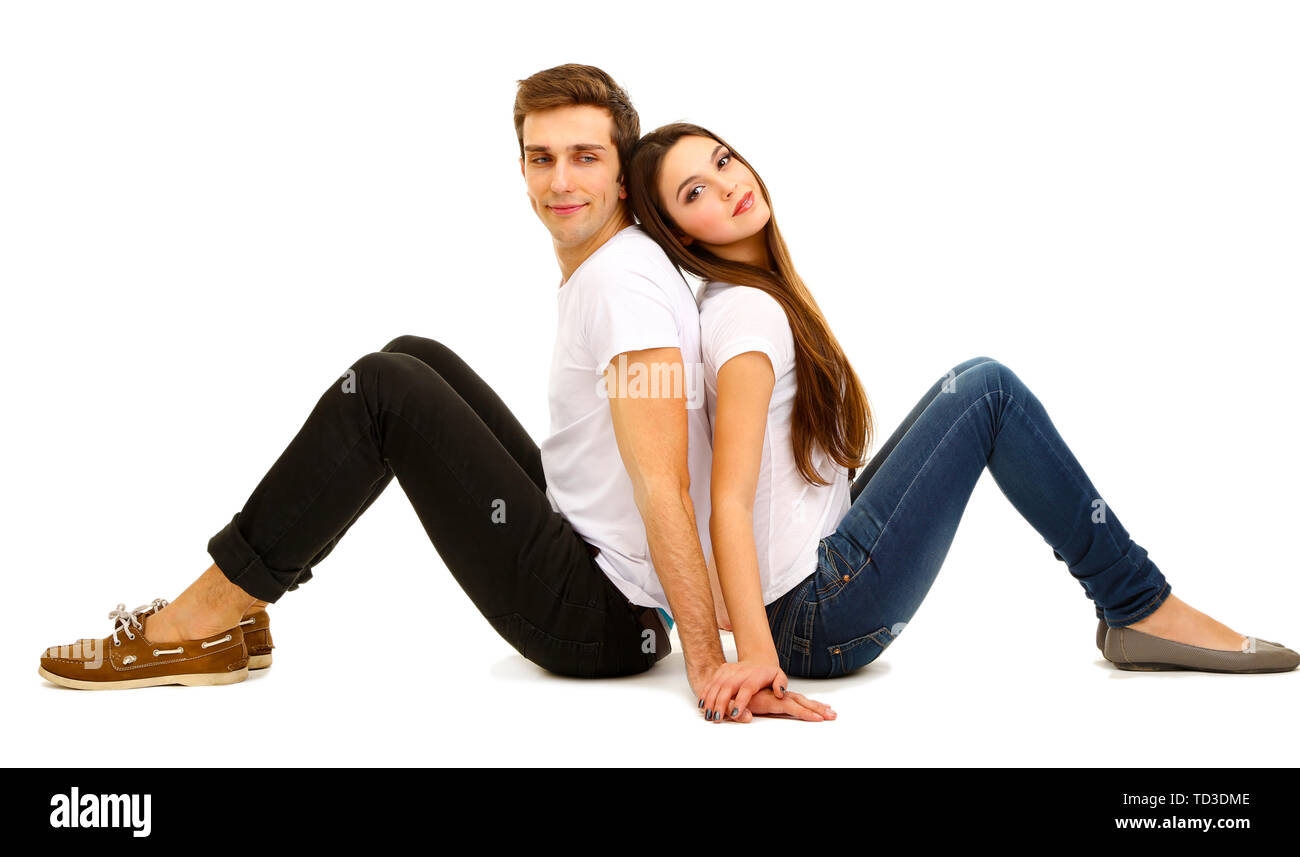 Loving couple sitting with back to each other on floor isolated on ...