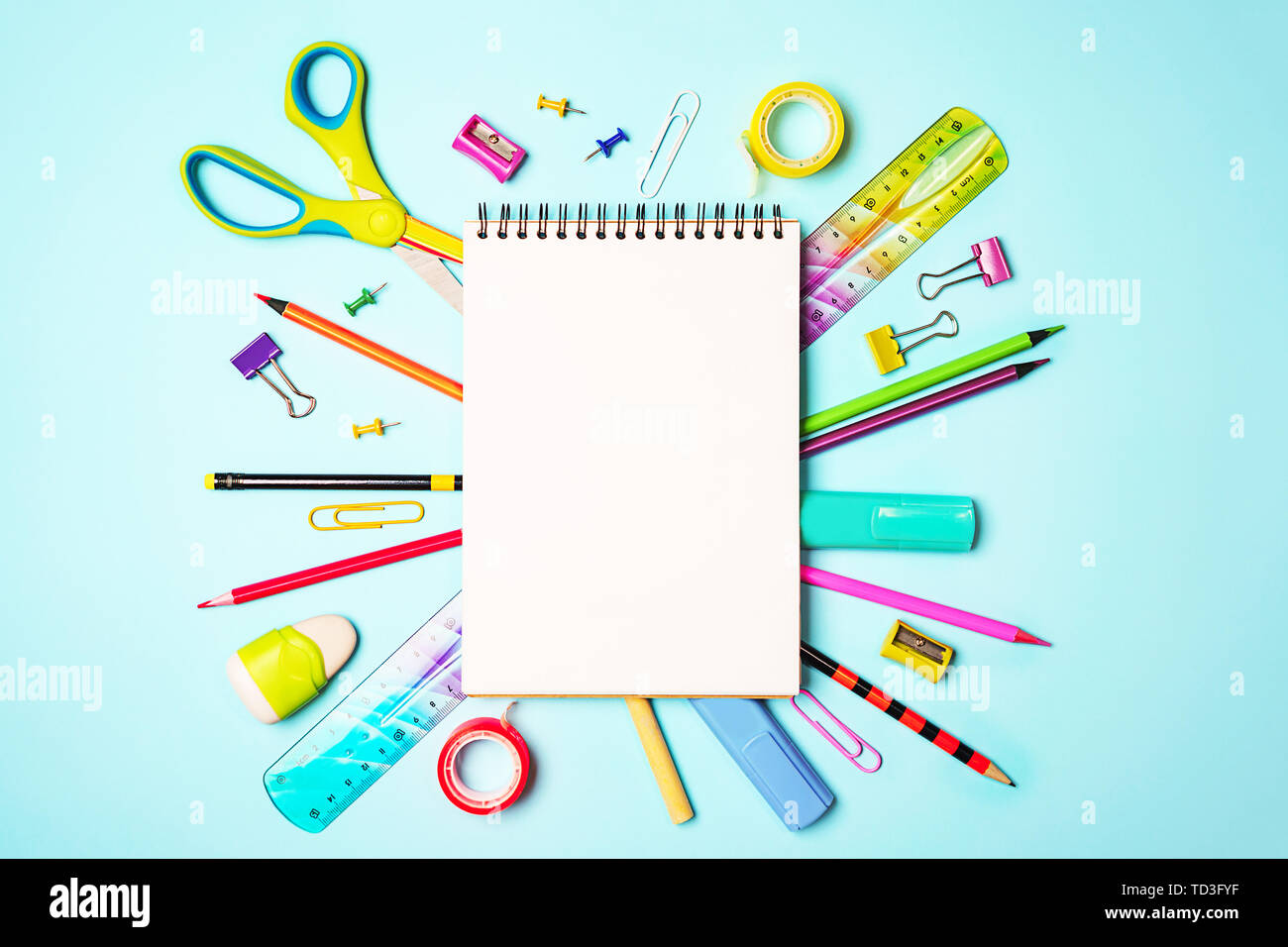 Back to school background with notepad, colorful pencils, square ruler ...