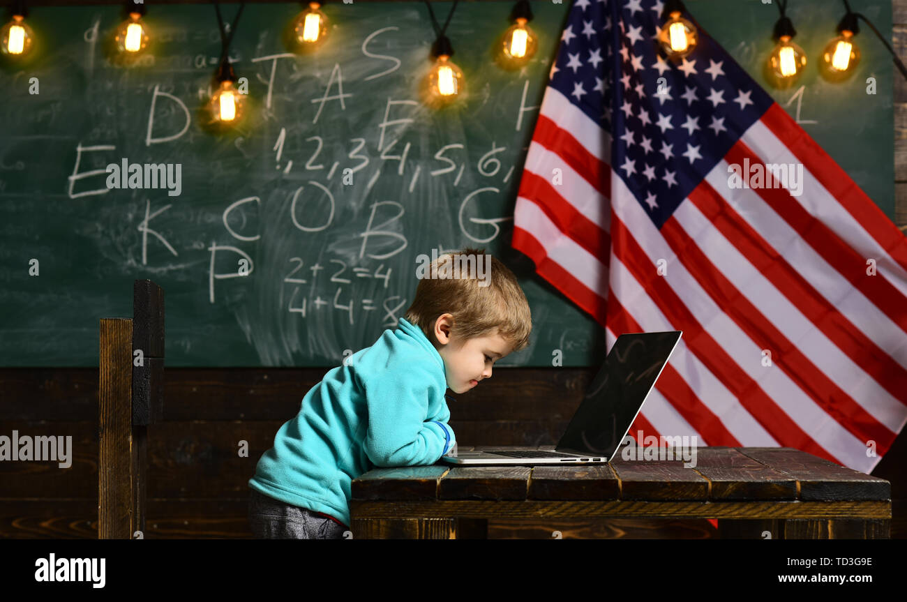 pupil using computer in elementary school lesson Stock Photo - Alamy