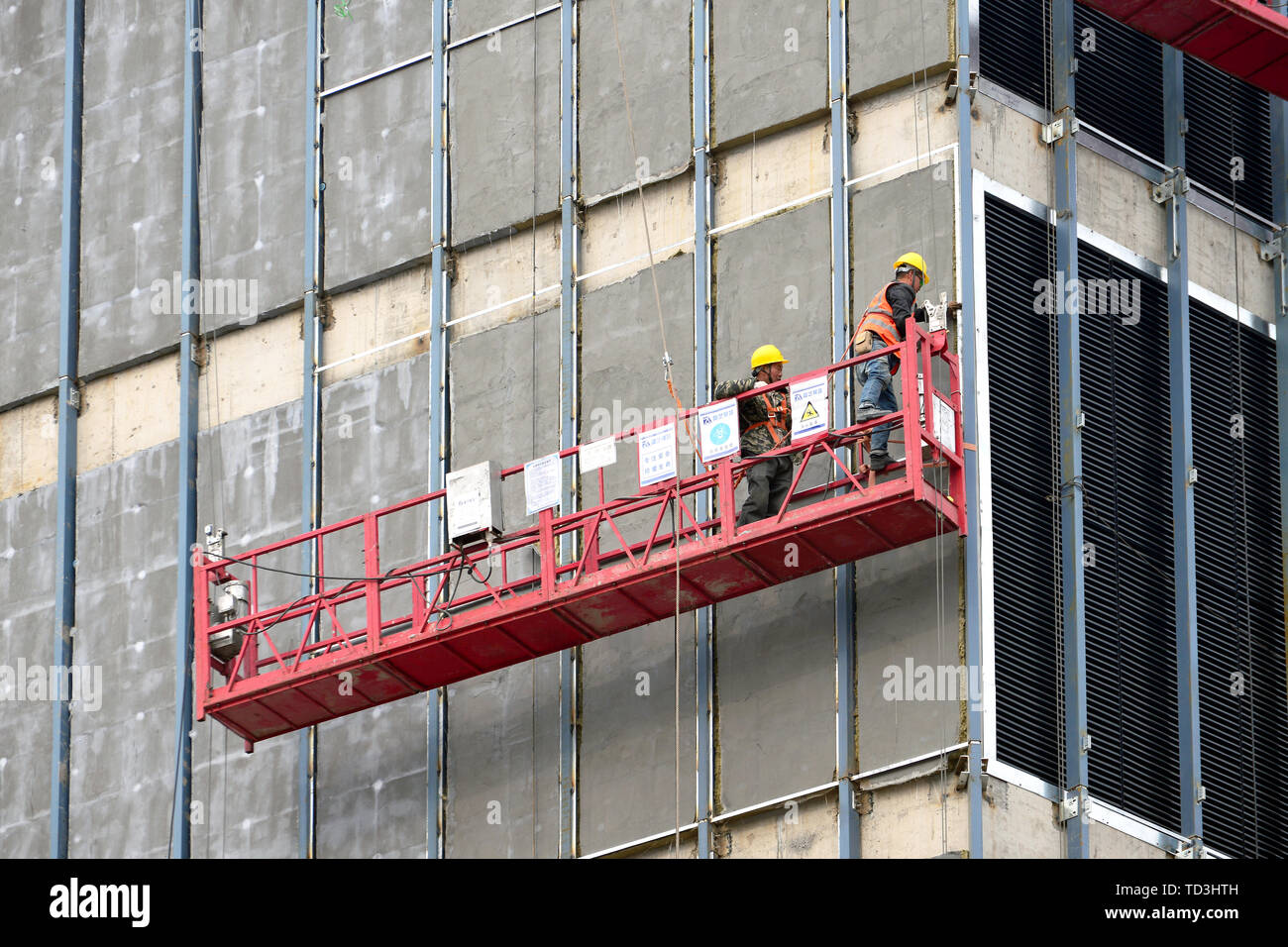 High-altitude operation at construction sites Stock Photo - Alamy