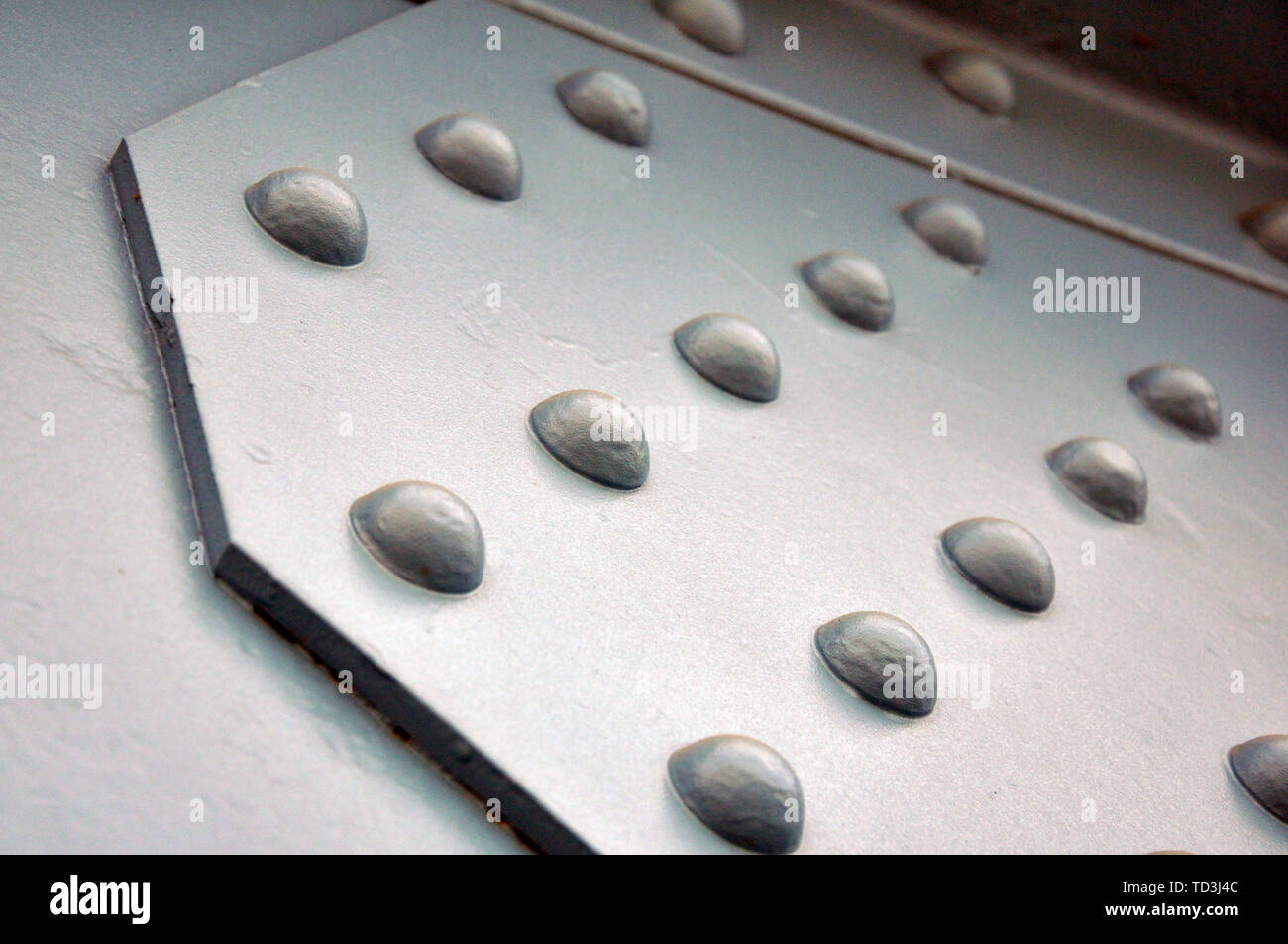 Steel girder bridge construction, riveted joint. texture background ...