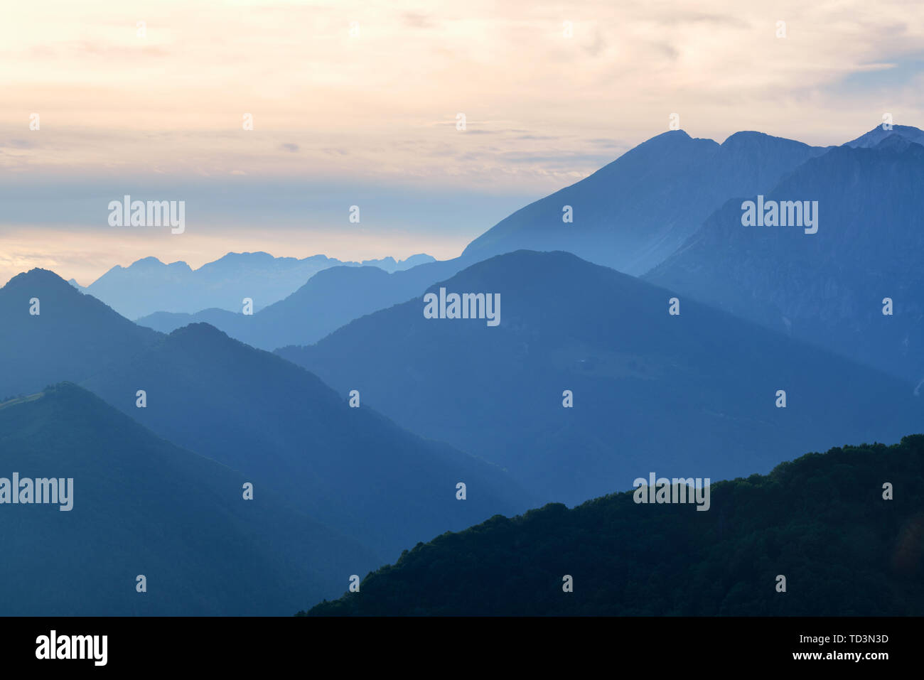 Beautiful evening mountain range landscape Stock Photo - Alamy