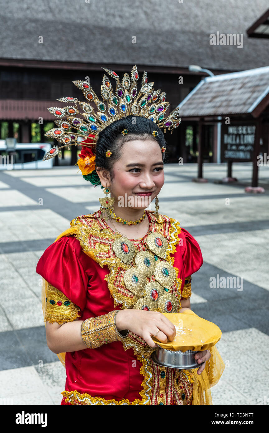 South sulawesi traditional dress hi-res stock photography and images ...