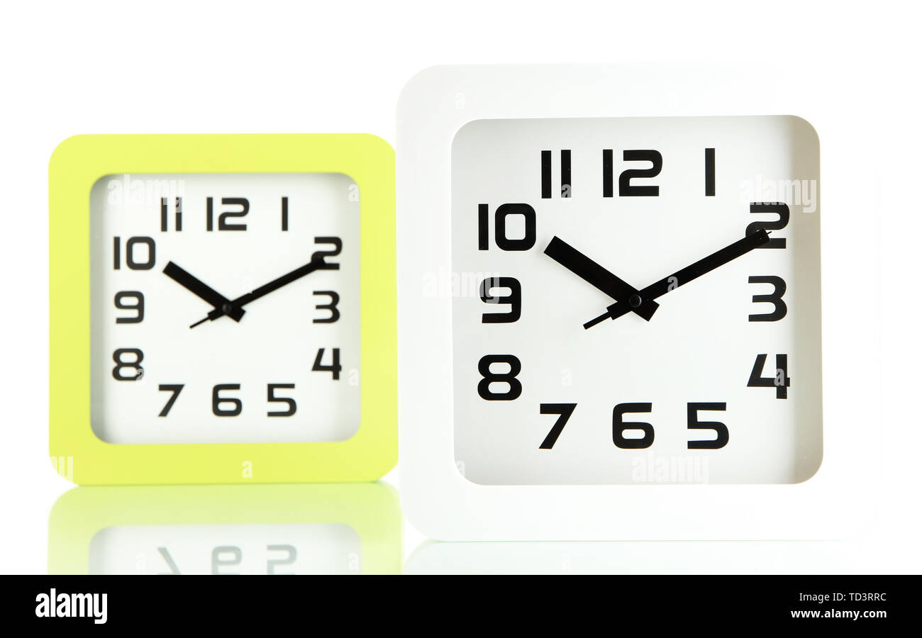 Two office clocks, isolated on white Stock Photo - Alamy