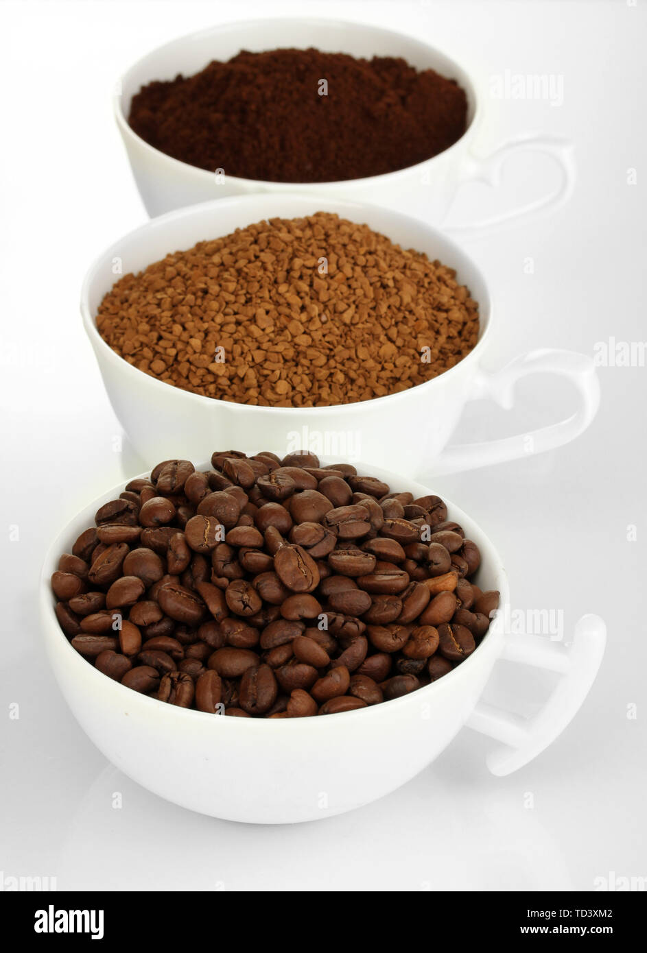 Different types of coffee in three cups isolated on white Stock Photo ...