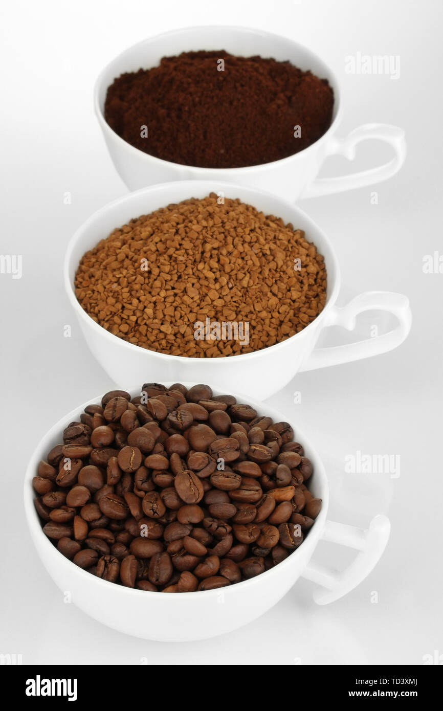 Different types of coffee in three cups isolated on white Stock Photo ...