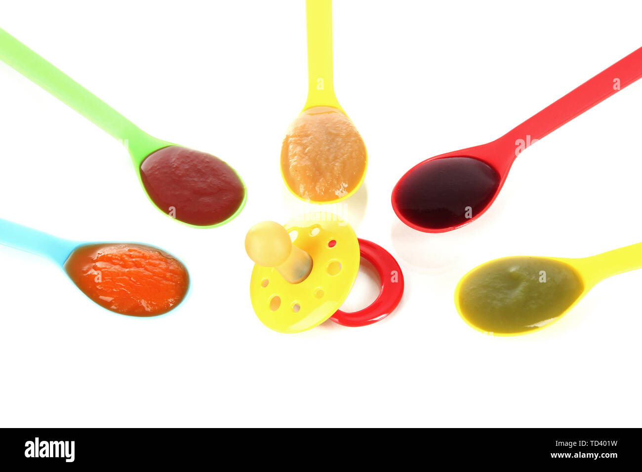 Baby puree in spoons with nipple isolated on white Stock Photo - Alamy