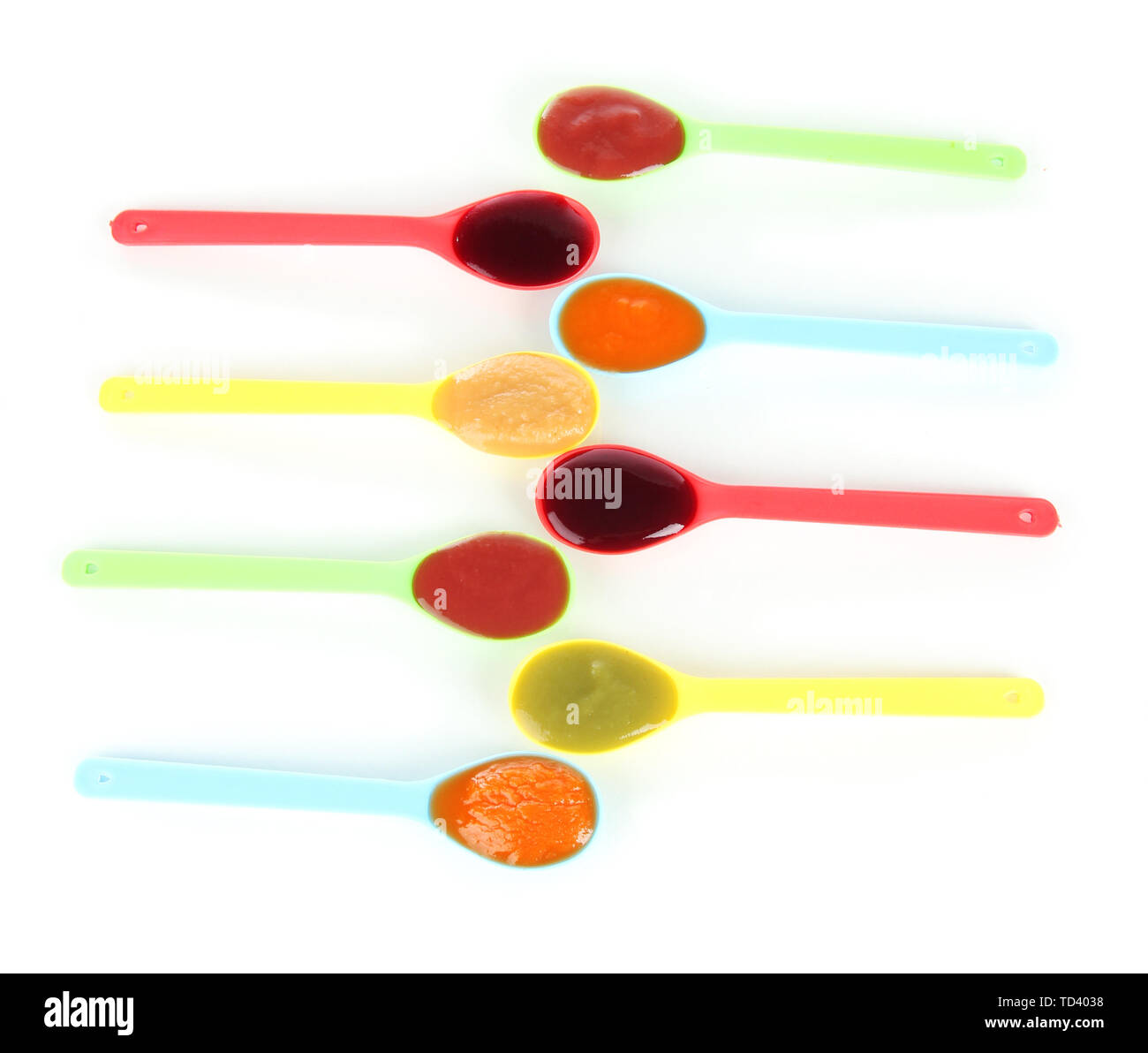 Baby puree in spoons isolated on white Stock Photo - Alamy