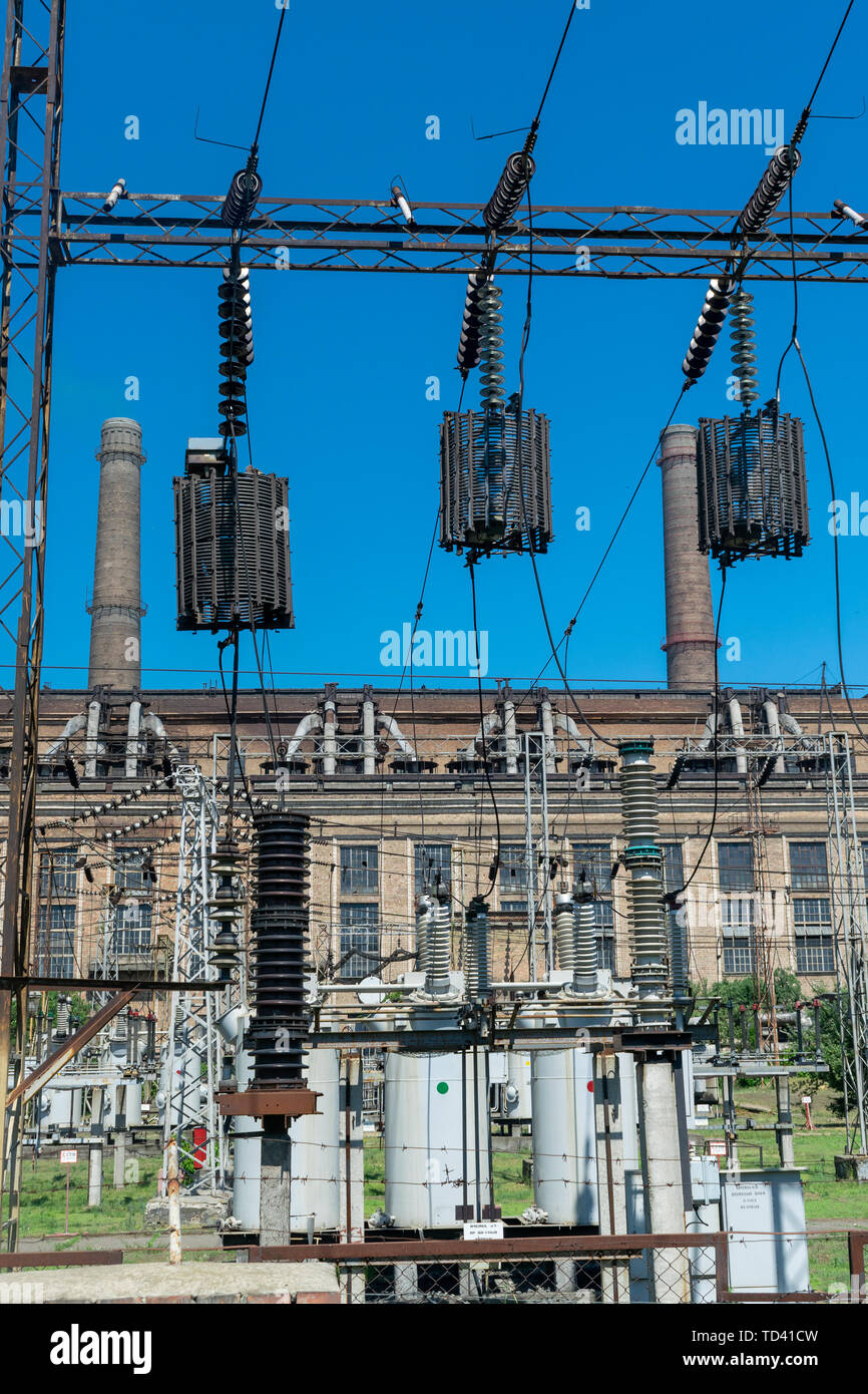 Old power plant electric distribution gear against blue sky Stock Photo ...