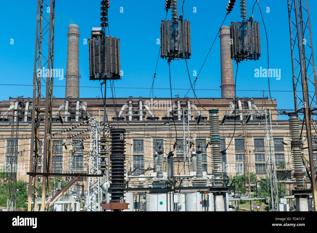 Old power plant electric distribution gear against blue sky Stock Photo ...
