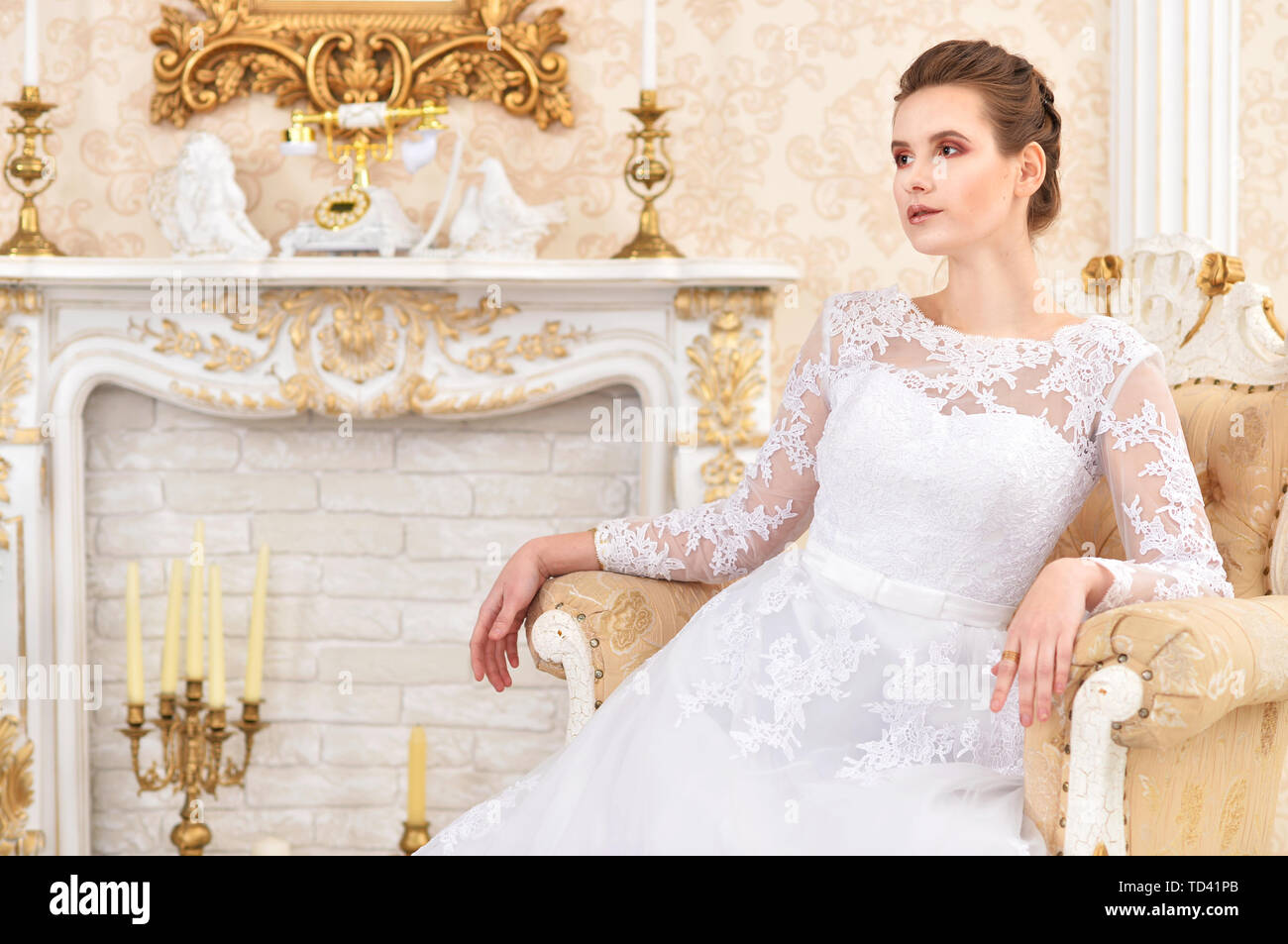 Bride sitting on chair hi-res stock photography and images - Alamy