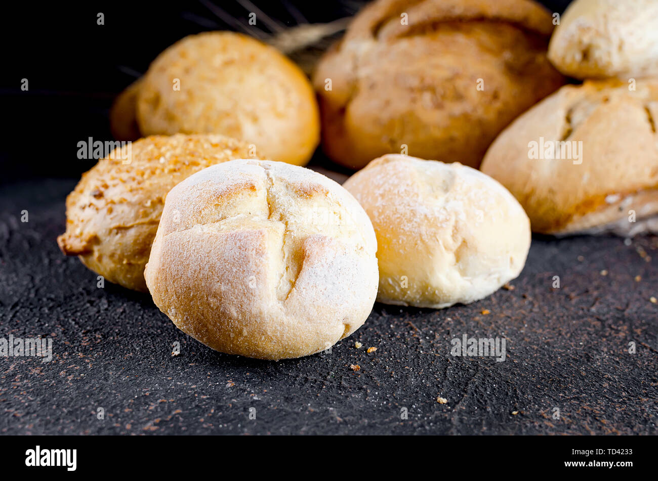 assortment of different types of bread, loaf, baguettes, loaves, rolls ...