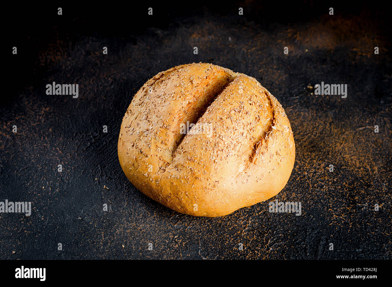 Circle Loaf of Rye bread on black background, healthy concept, copy ...
