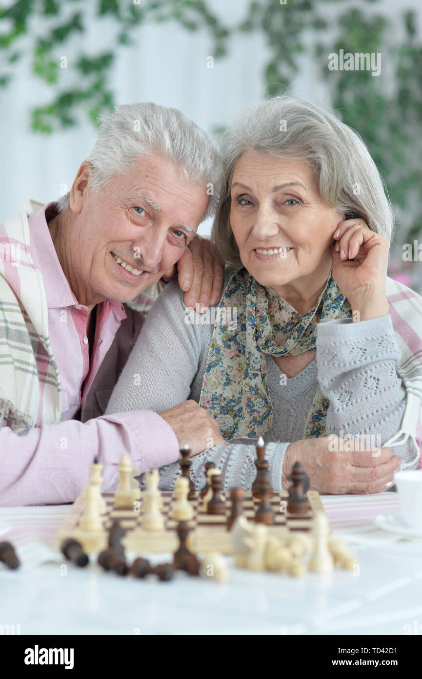 Old man woman playing chess hi-res stock photography and images - Alamy
