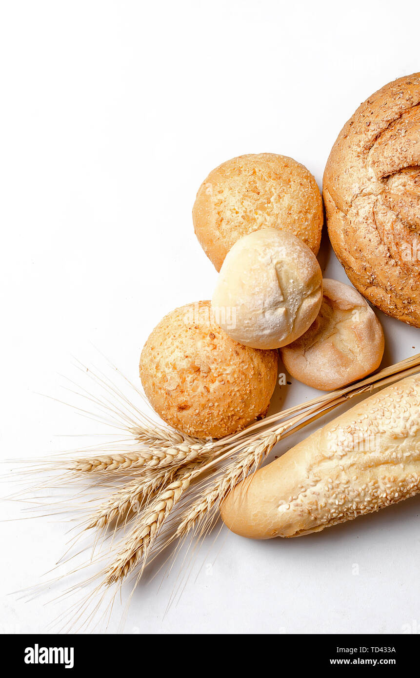 assortment of different types of bread, loaf, baguettes, loaves, rolls ...
