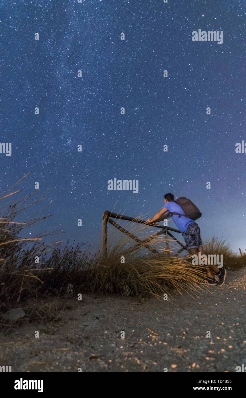Starry night and person hi-res stock photography and images - Alamy