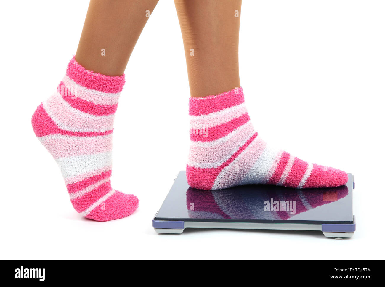 Feet on scales hi-res stock photography and images - Alamy