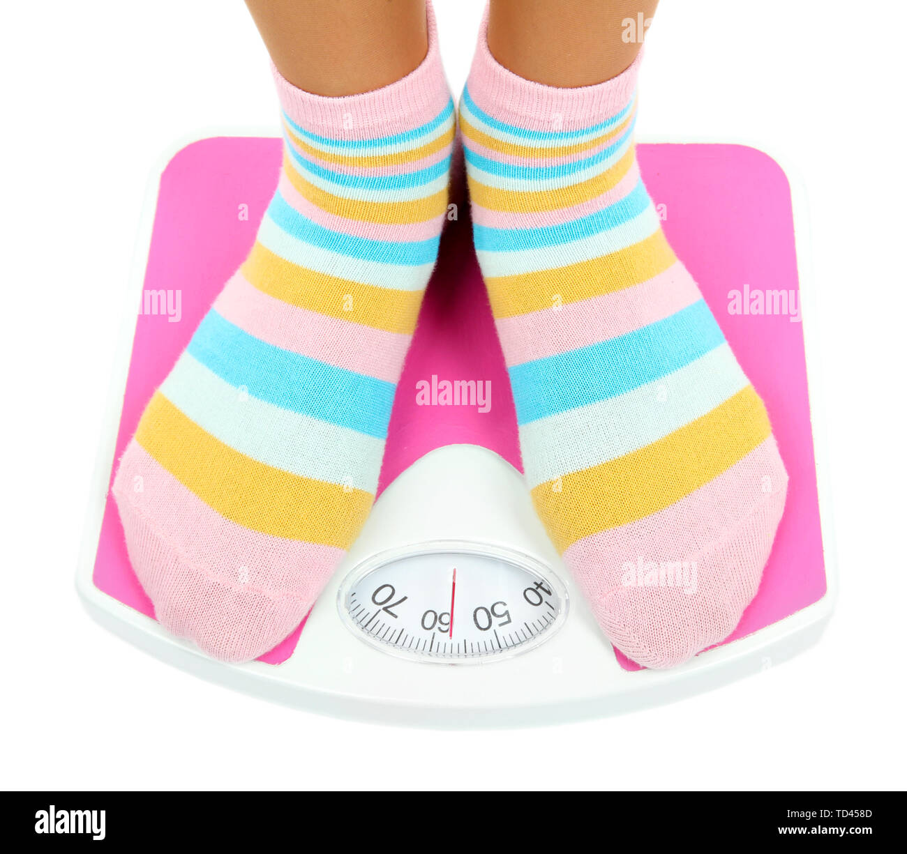 Feet on scales Cut Out Stock Images & Pictures - Alamy