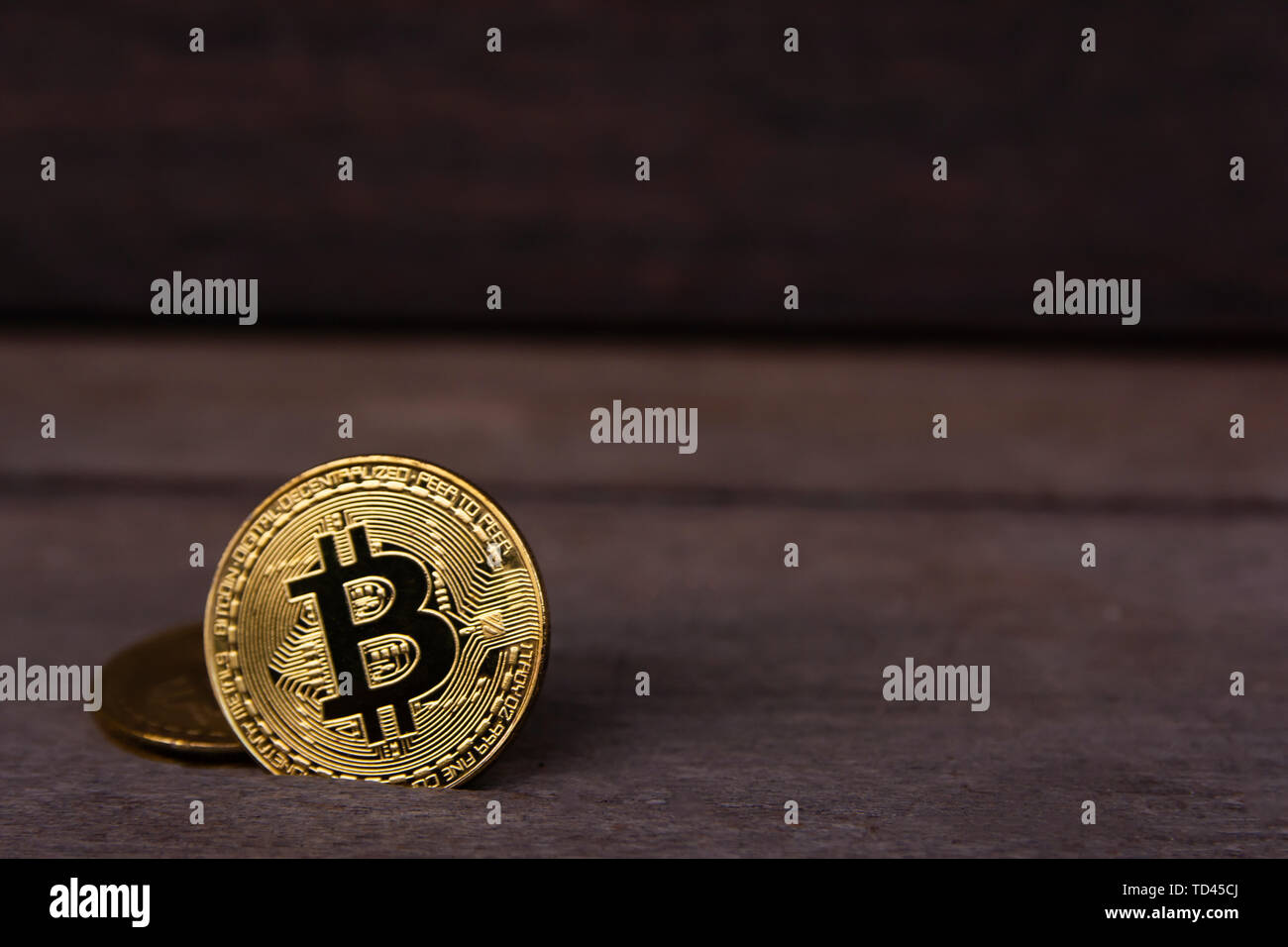 Bitcoin gold coin on dark wood background with copy space Stock Photo ...