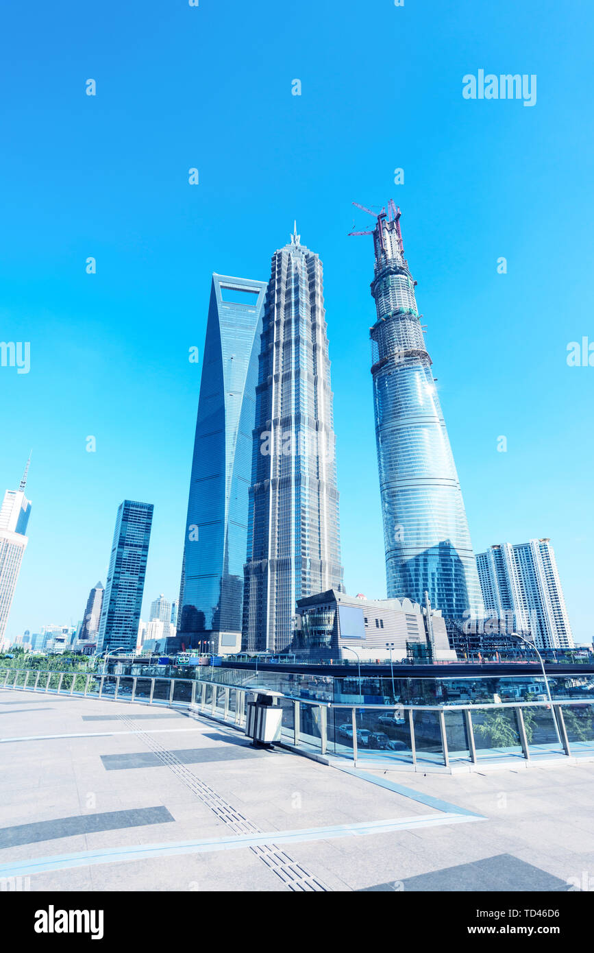 modern office buildings in shanghai from empty footpath Stock Photo - Alamy