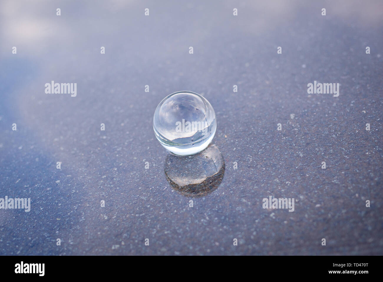 Crystal glass ball reflection Stock Photo - Alamy