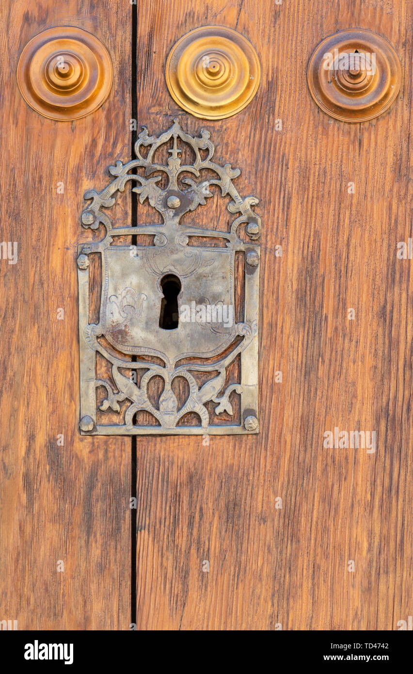 Keyhole in an old paneled wooden door; rusty and weathered Stock Photo ...
