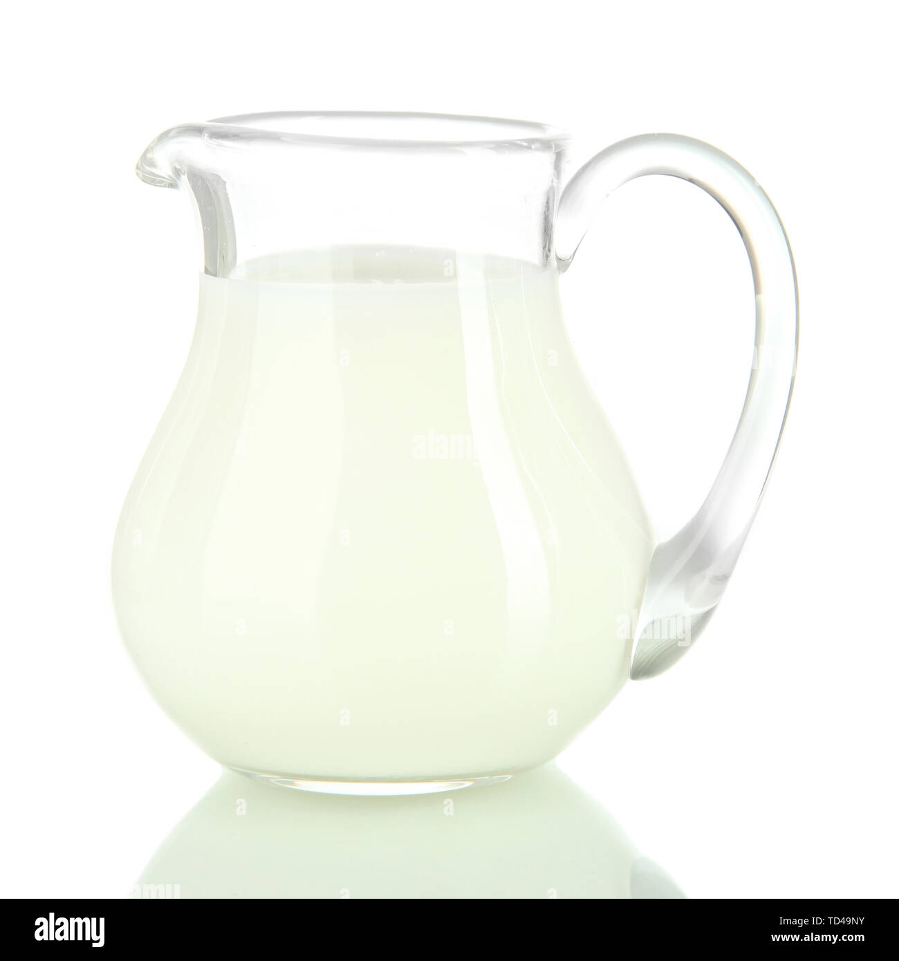 Pitcher of milk isolated on white Stock Photo - Alamy