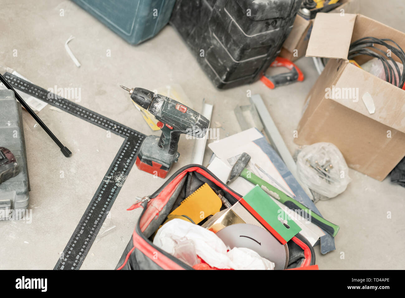 Variety of repair tools on concrete floor. Old tools renovation, Repair ...
