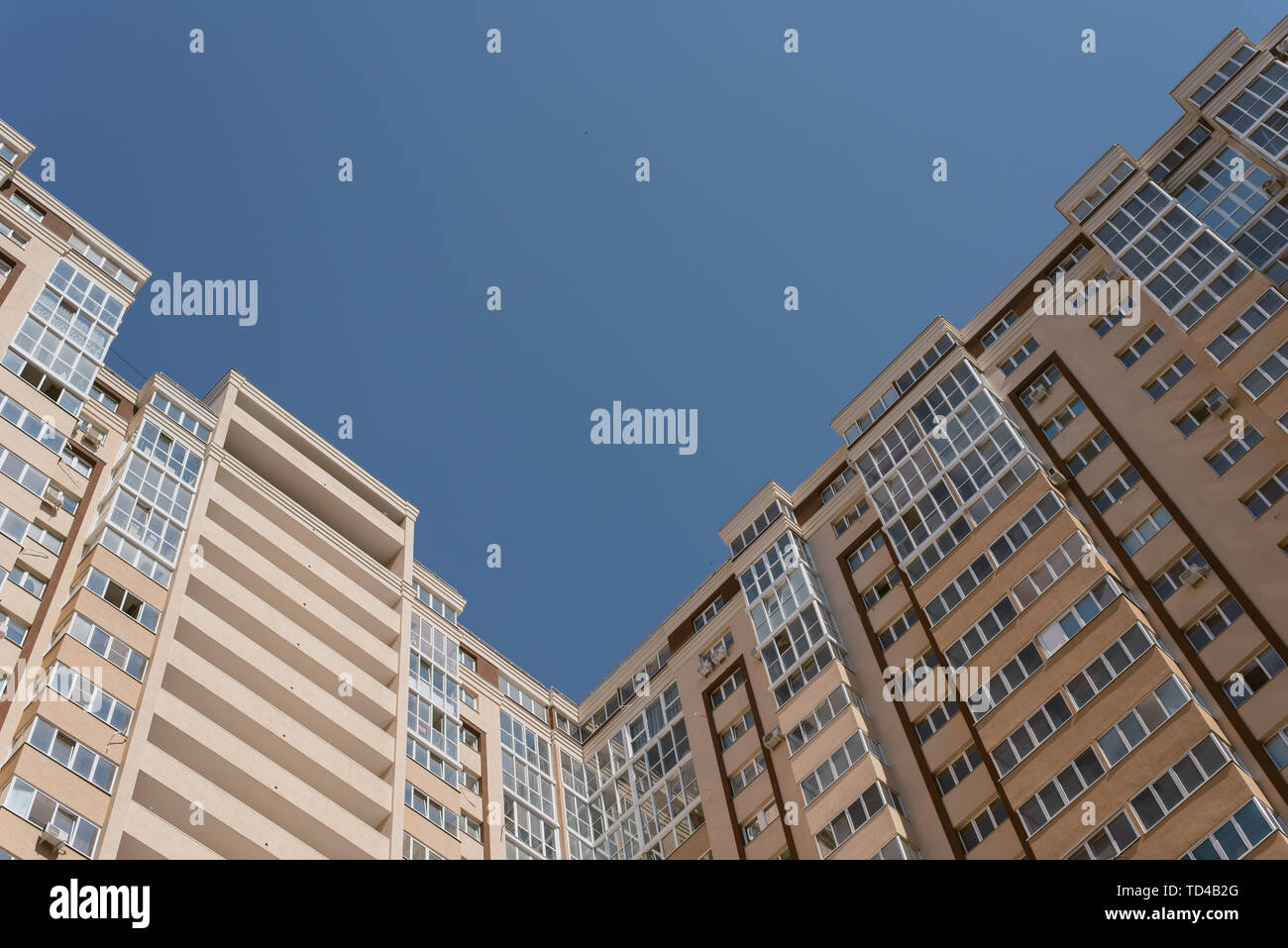 high-rise angle. high-rise residential brick complex. housing for ...