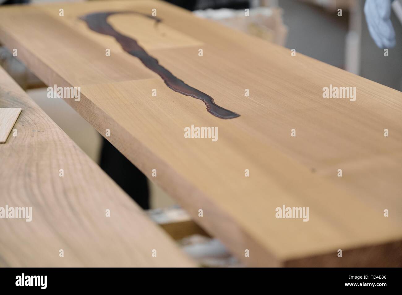 Person coating wood hi-res stock photography and images - Alamy