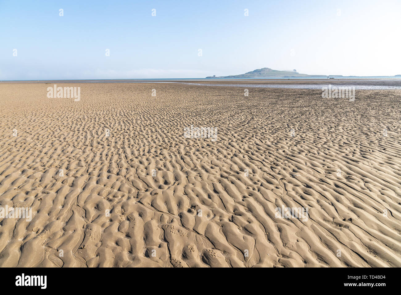 Low tide in Burrow beach with Ireland's Eyes island in background ...