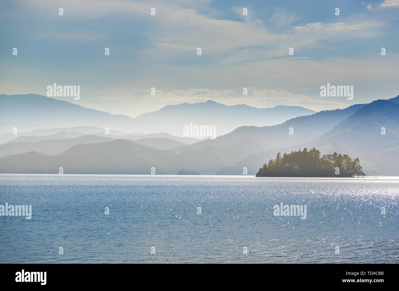Island on Lugu Lake, Yunnan Province Stock Photo - Alamy