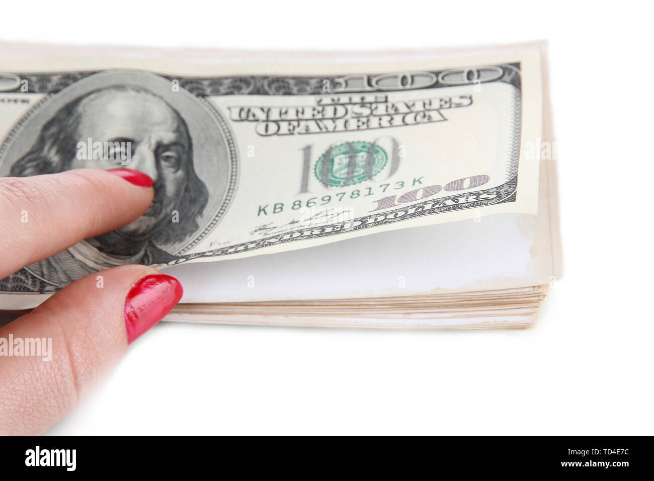Hand and wad of paper isolated on white Stock Photo - Alamy