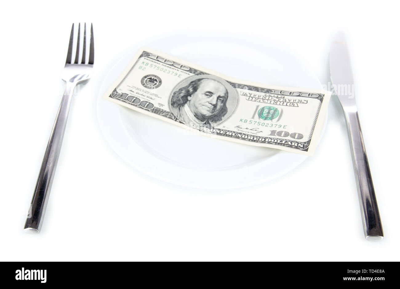 Money on plate isolated on white Stock Photo - Alamy