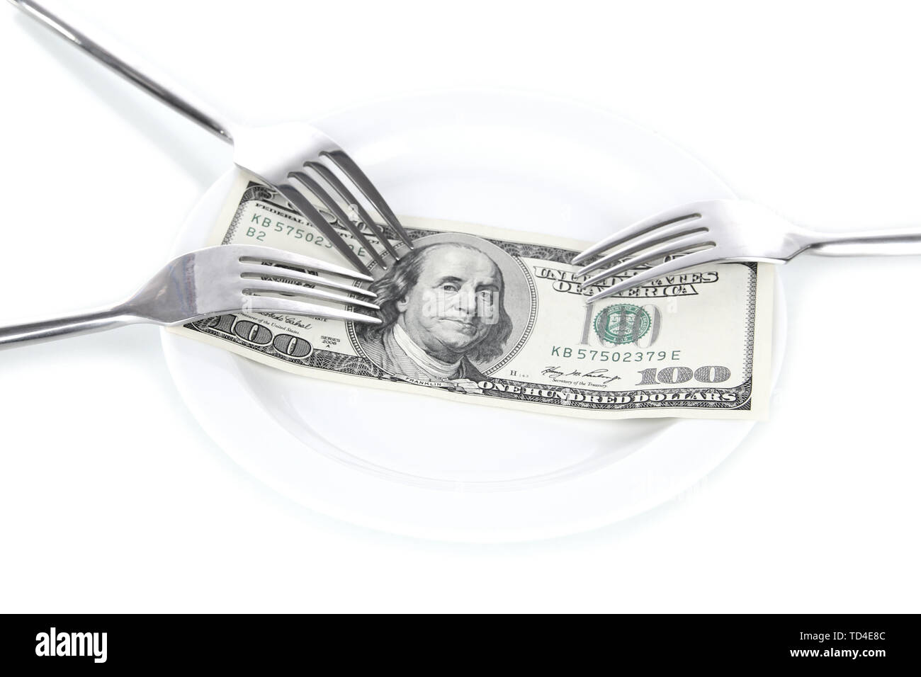 Money on plate isolated on white Stock Photo - Alamy