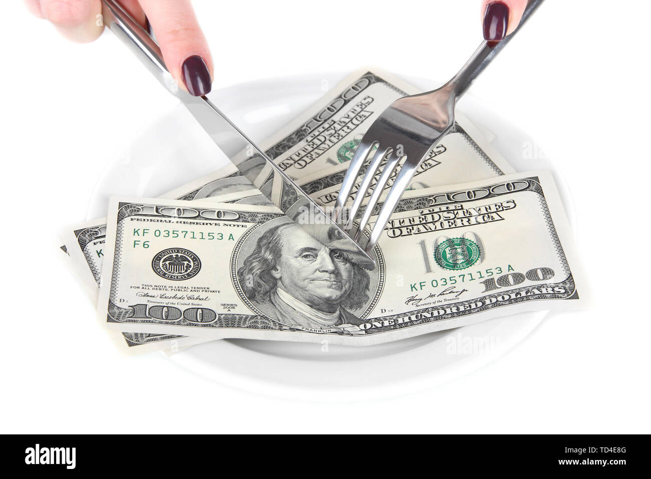 Money on plate isolated on white Stock Photo - Alamy