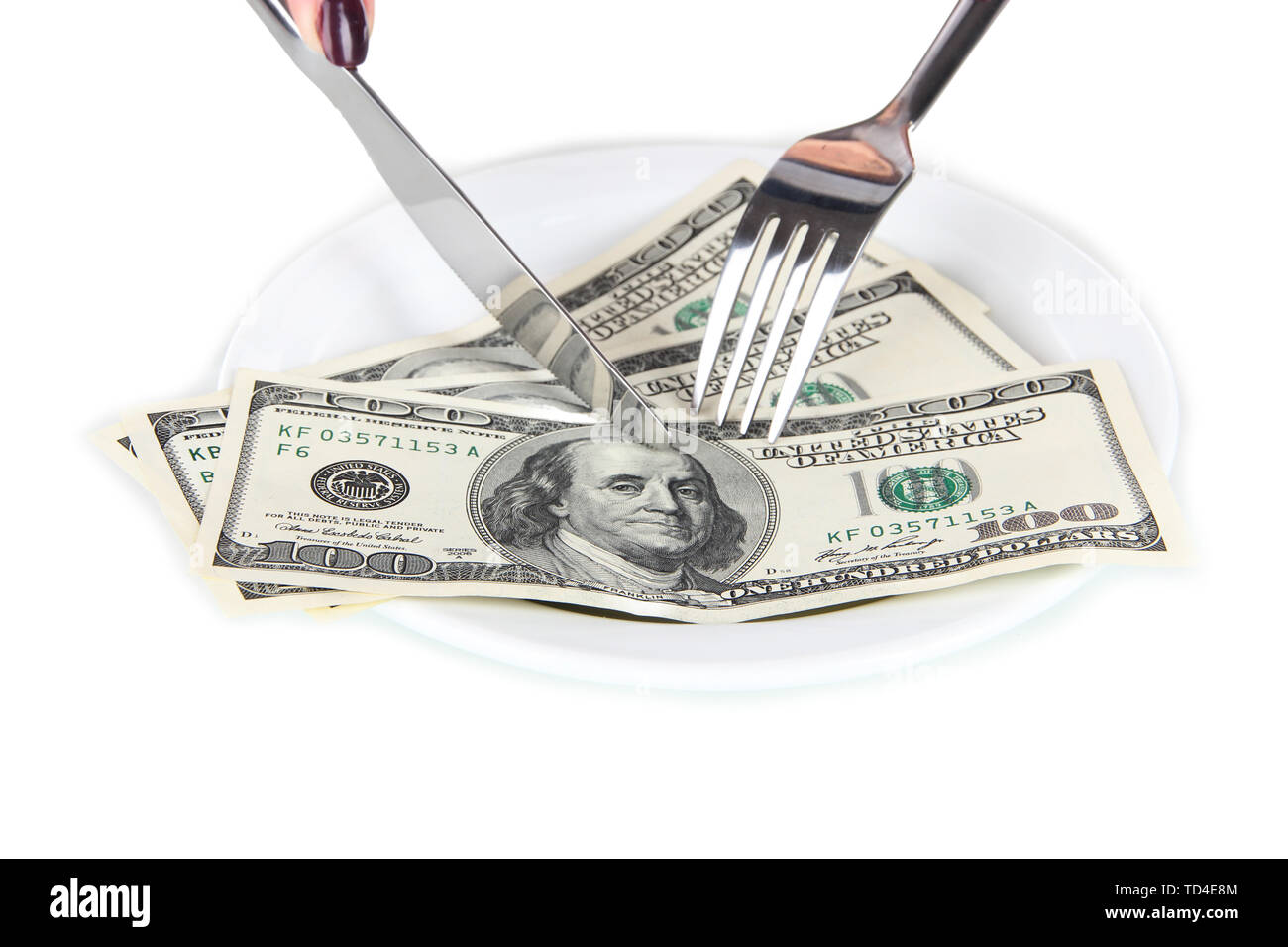 Money on plate isolated on white Stock Photo - Alamy