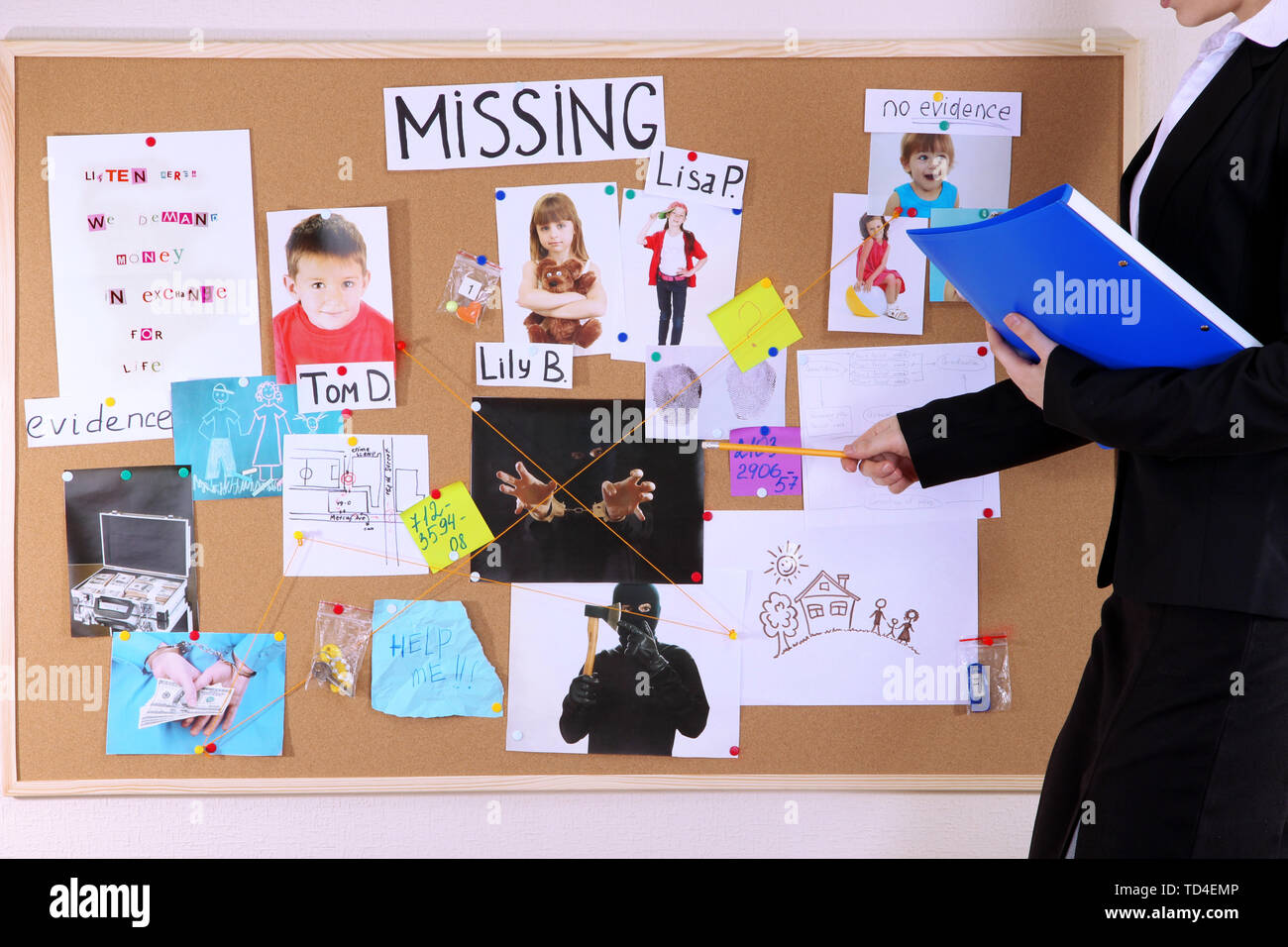 Detective investigating abduction of children Stock Photo - Alamy