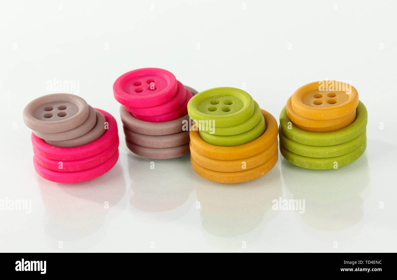 Bright colored buttons isolated on white Stock Photo - Alamy
