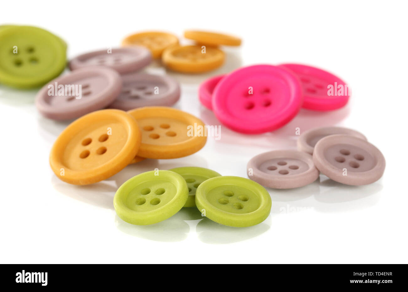Bright colored buttons isolated on white Stock Photo - Alamy