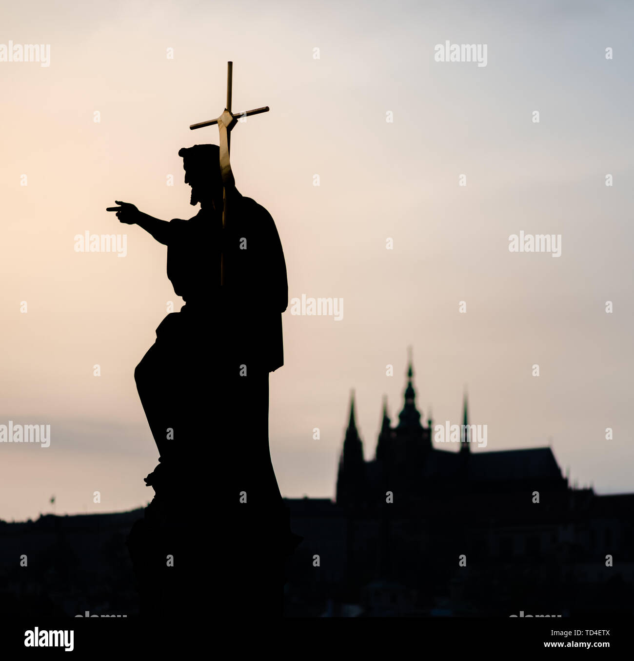Statue of saint, Charles Bridge and Prague castle, Czech republic ...